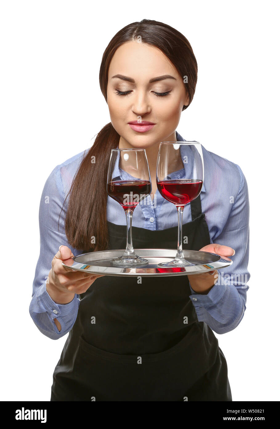 Portrait of elegant female sommelier on white background Stock Photo ...