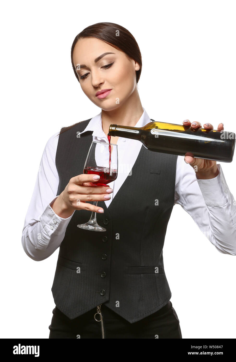 Portrait of elegant female sommelier on white background Stock Photo ...