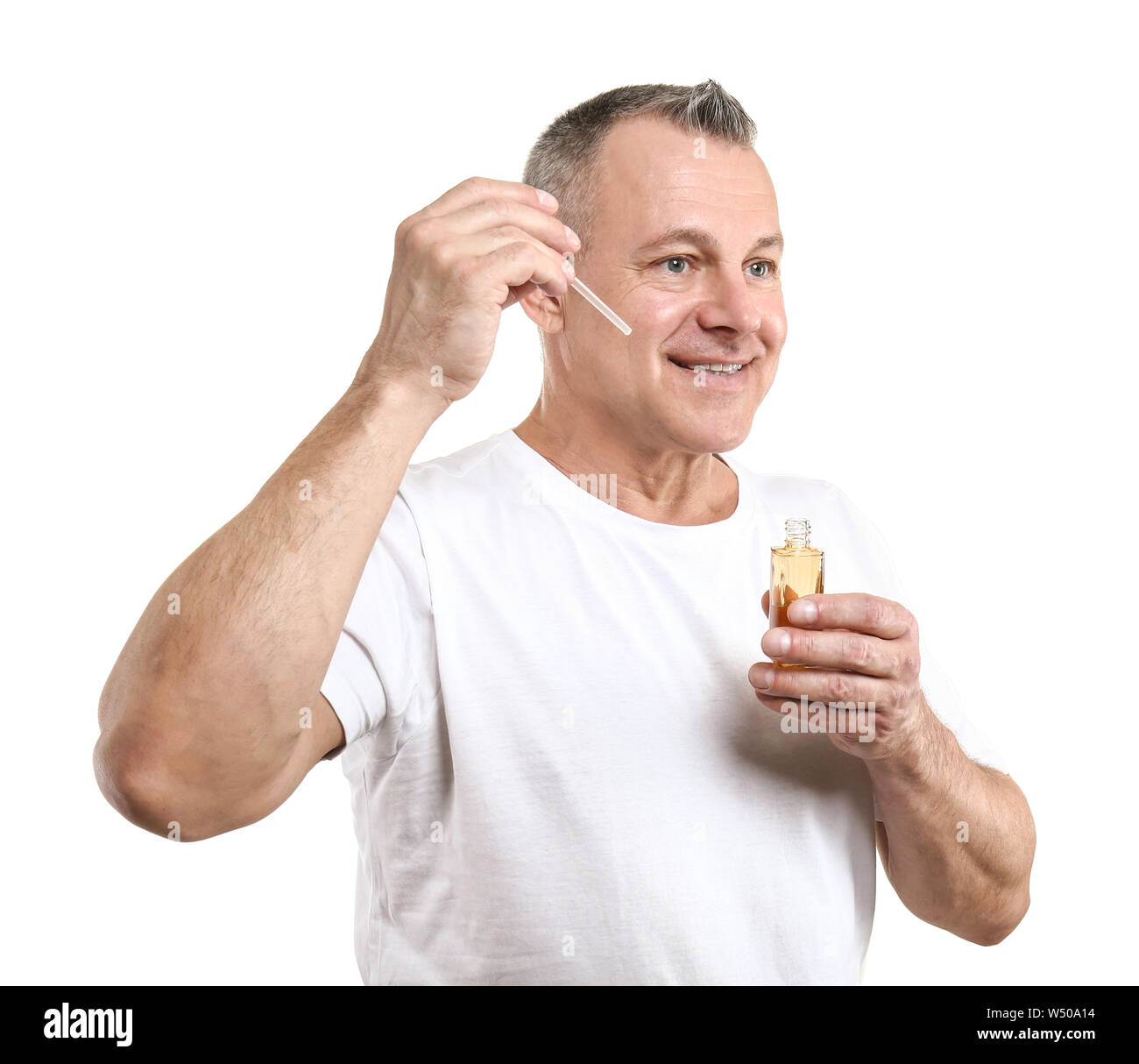 Apply face serum by bottle hi-res stock photography and images - Alamy