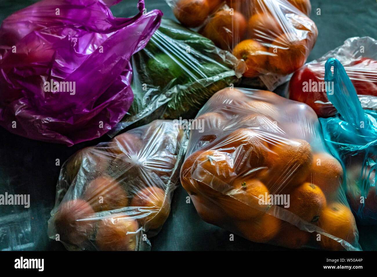 plastic packages begs with fresh fruits veggies after the market Stock ...