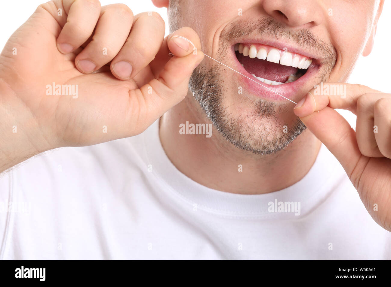 Man flossing teeth hi-res stock photography and images - Alamy