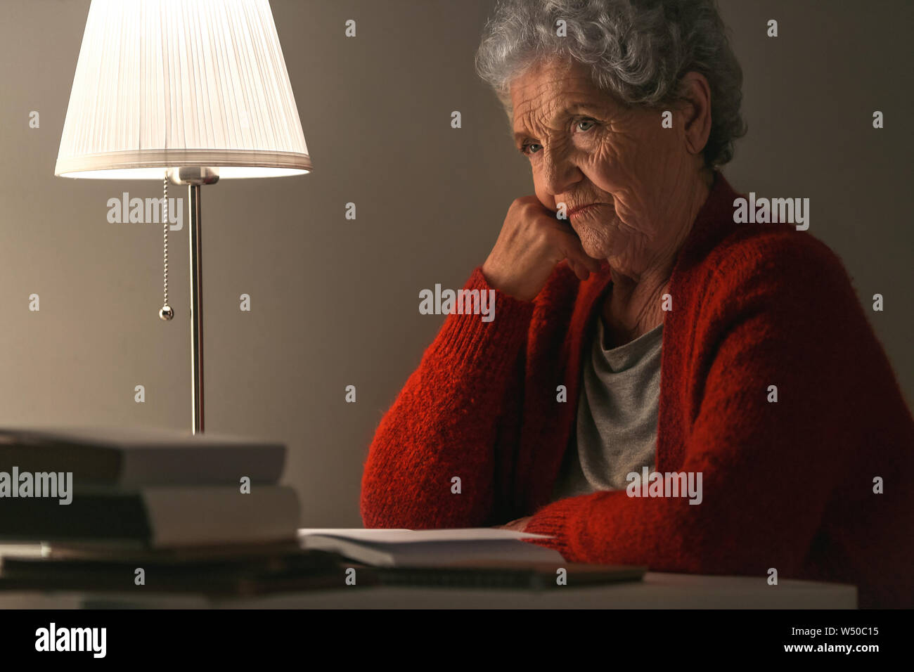 Lonely old woman reading hi-res stock photography and images - Alamy