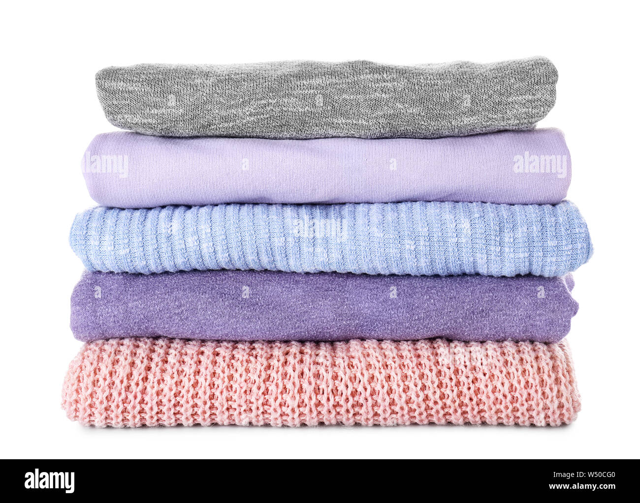 Stack of clean clothes on white background Stock Photo - Alamy