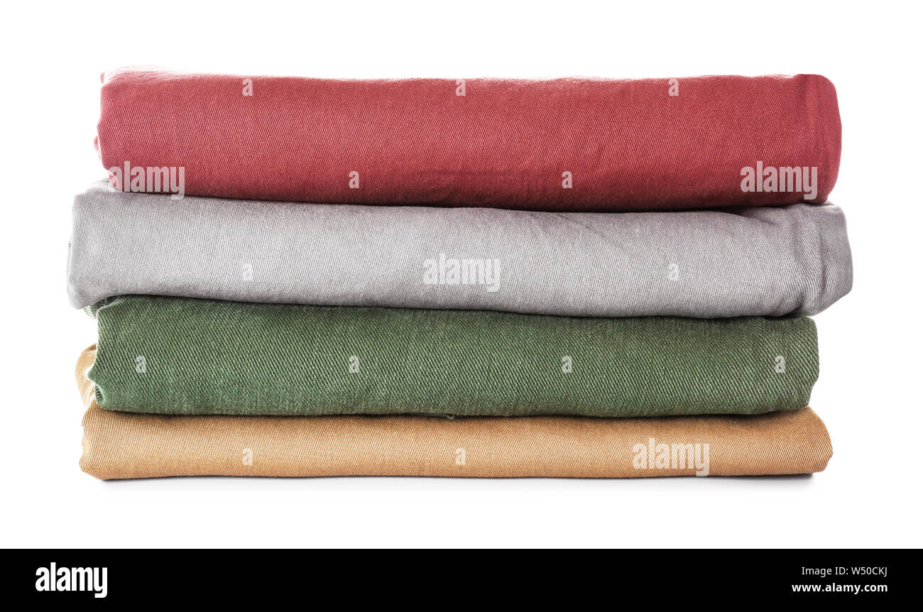 Stack of clean clothes on white background Stock Photo - Alamy
