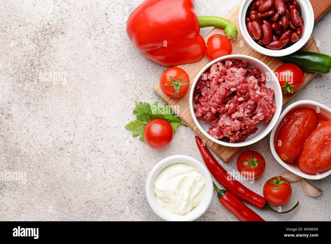 Ingredients for chili con carne on grey background Stock Photo - Alamy