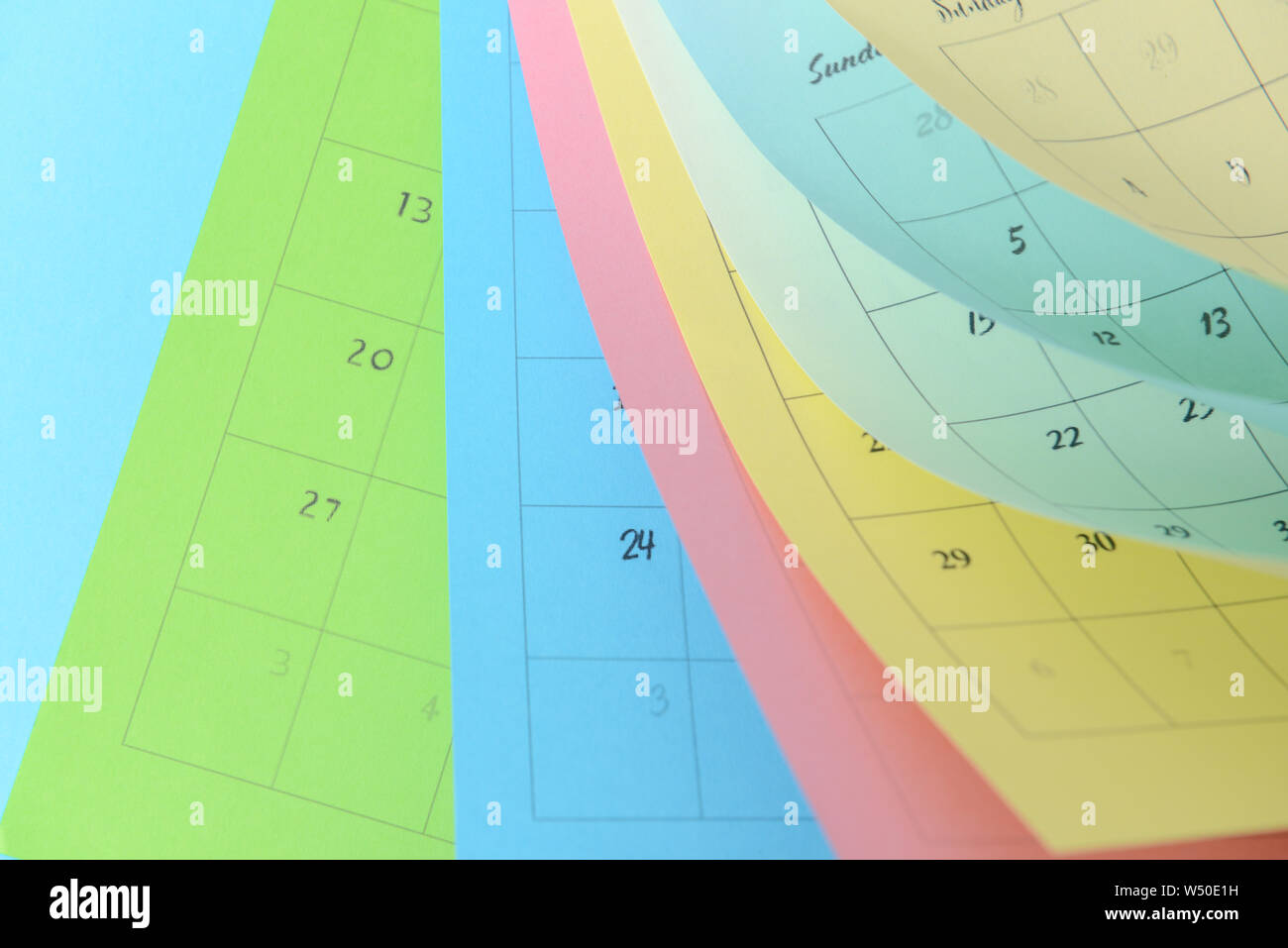 Colorful pages of paper calendar, closeup Stock Photo - Alamy