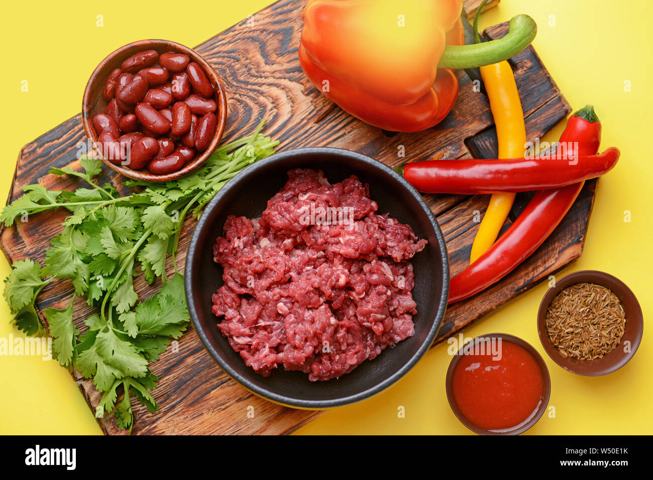 Ingredients for chili con carne on color background Stock Photo - Alamy