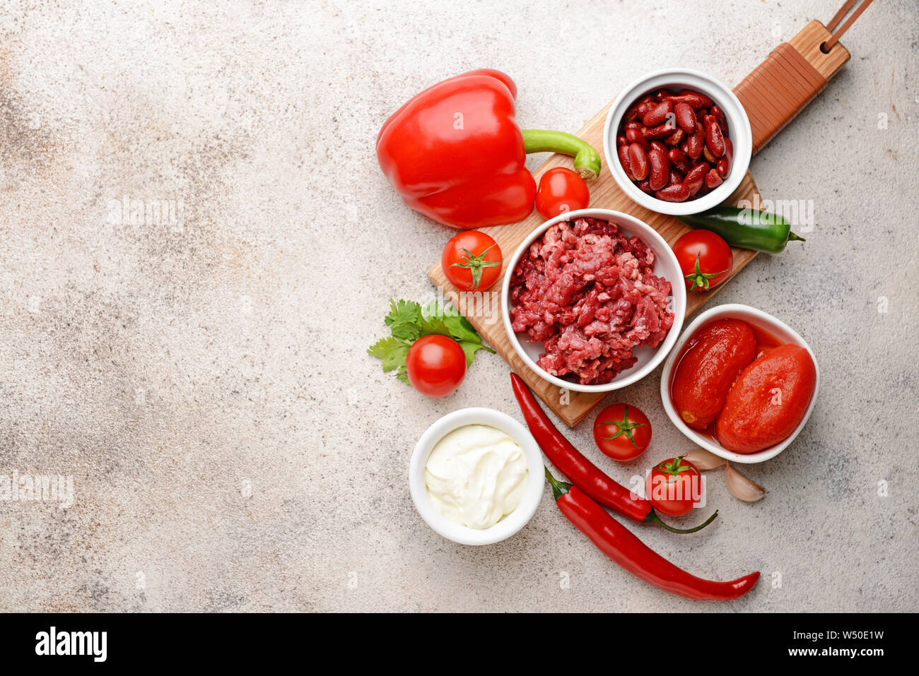 Ingredients for chili con carne on grey background Stock Photo - Alamy