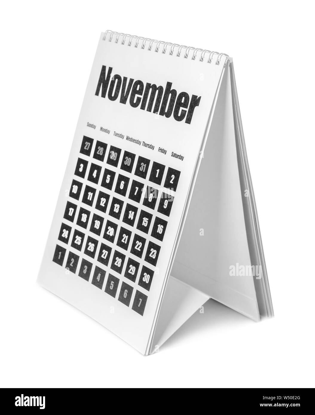 Flip calendar on white background Stock Photo - Alamy