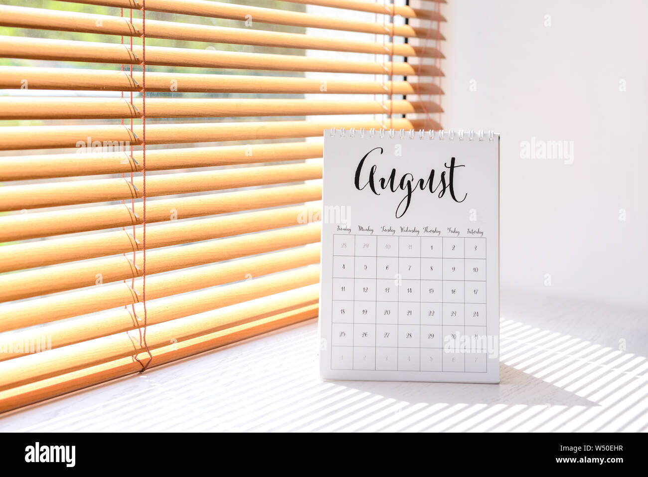 Flip calendar on window sill Stock Photo - Alamy