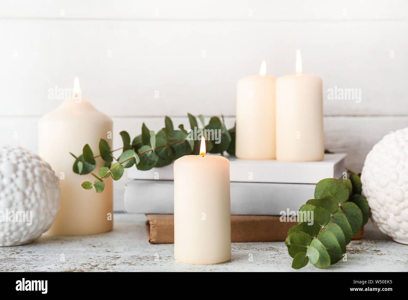 Beautiful burning candles eucalyptus hi-res stock photography and ...