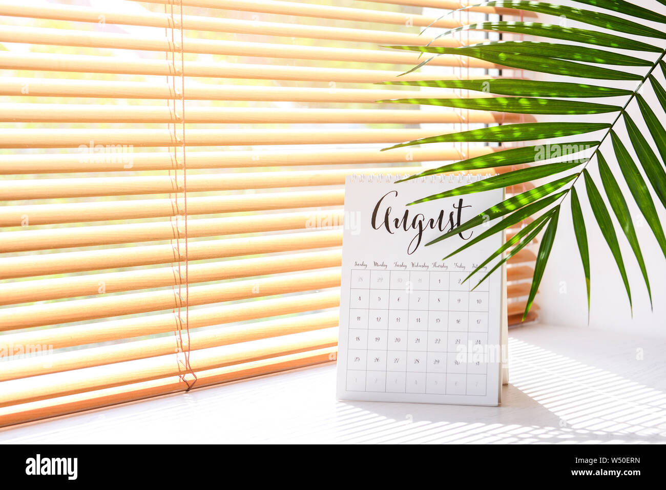 Flip calendar on window sill Stock Photo - Alamy