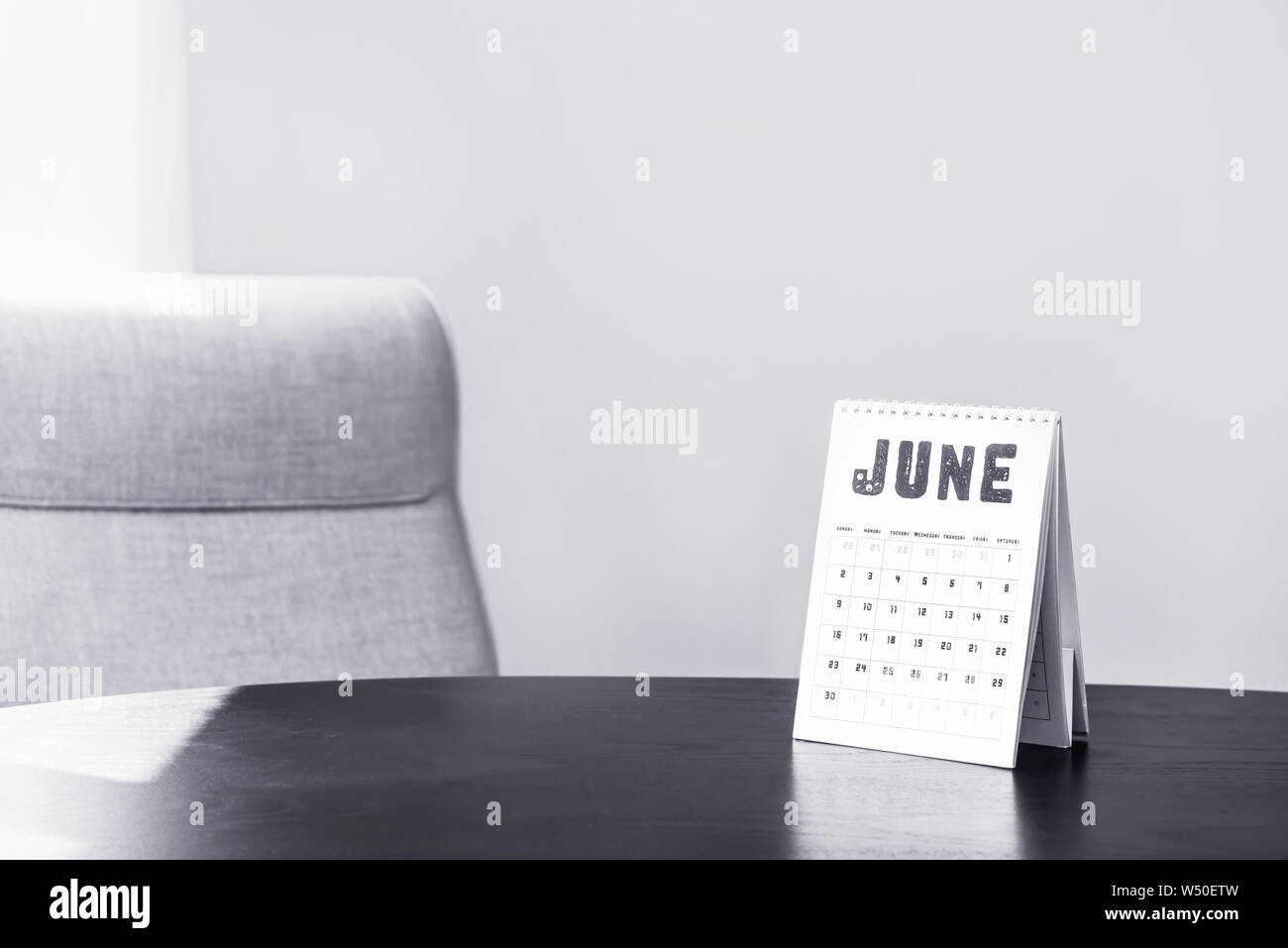 Flip calendar on table in office Stock Photo - Alamy