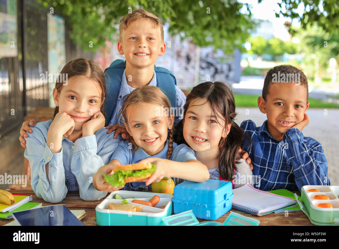 Little children having lunch outdoors Stock Photo - Alamy