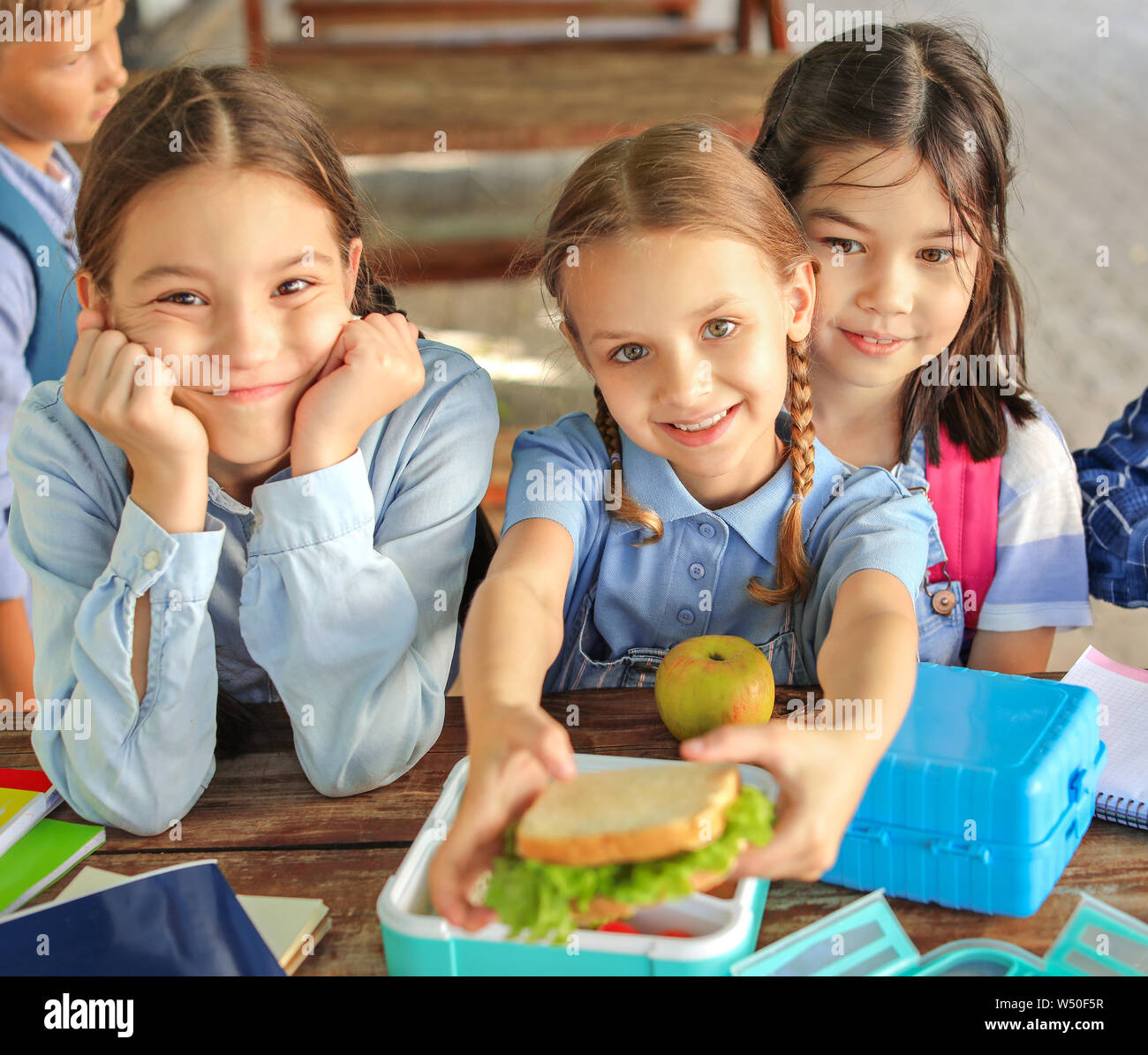 Little children having lunch outdoors Stock Photo - Alamy
