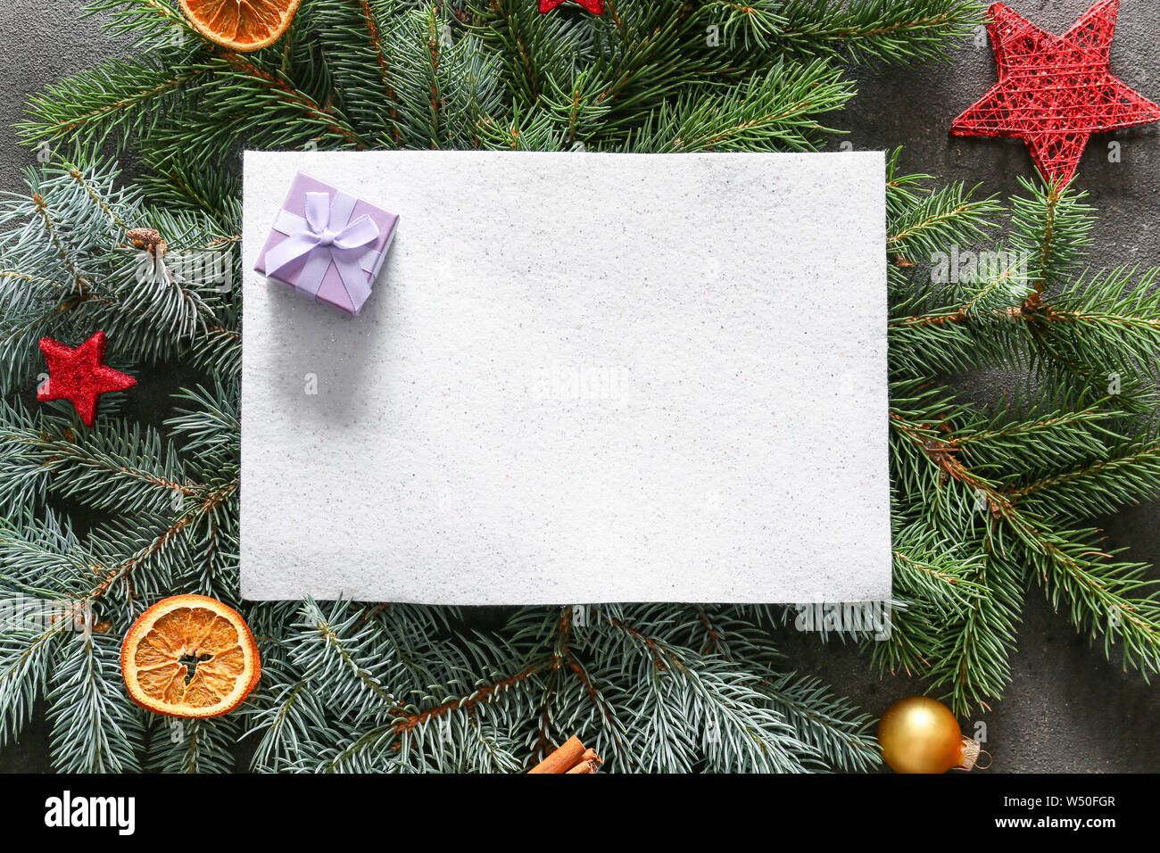 Blank card on beautiful Christmas wreath Stock Photo - Alamy