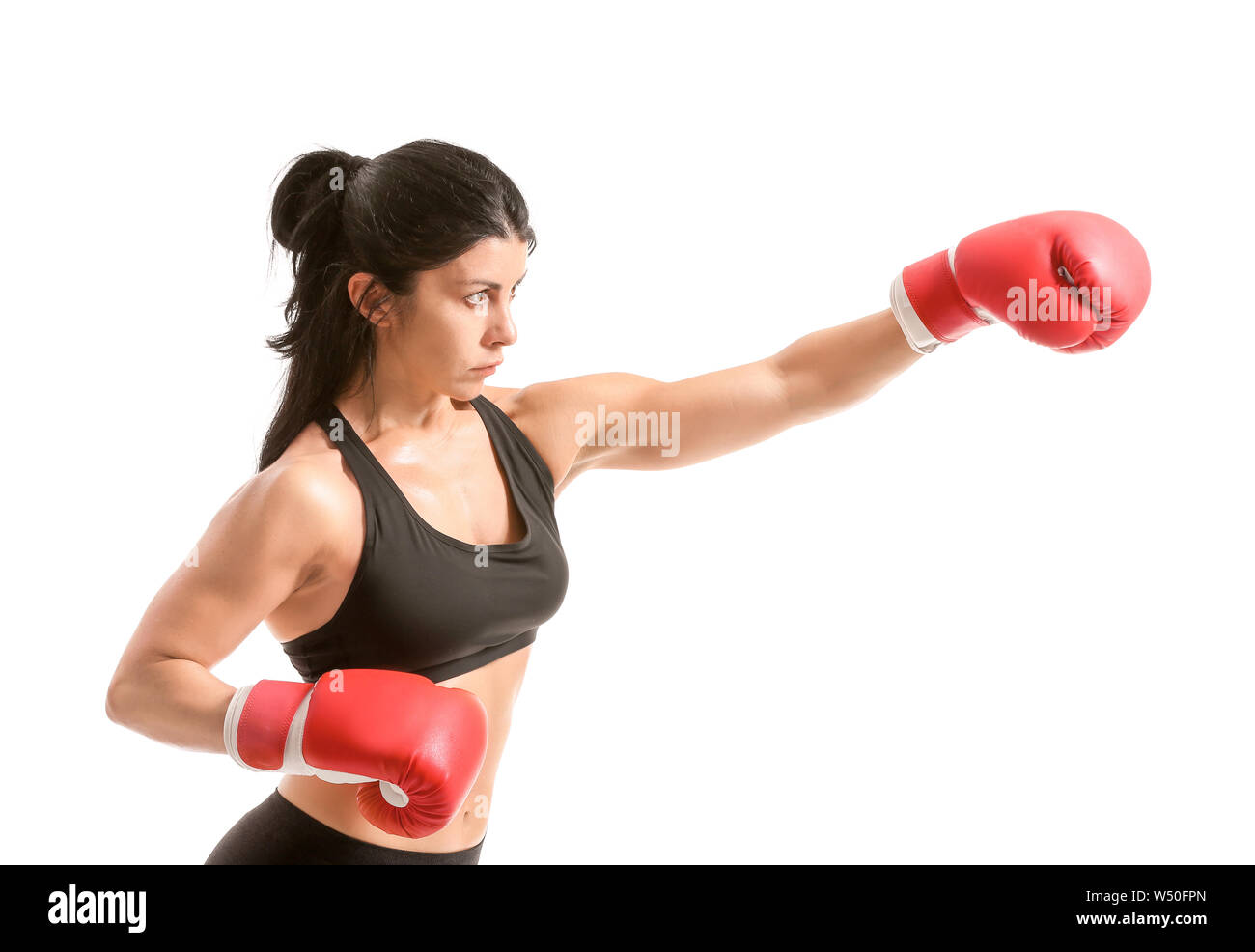 Sporty female boxer on white background Stock Photo - Alamy