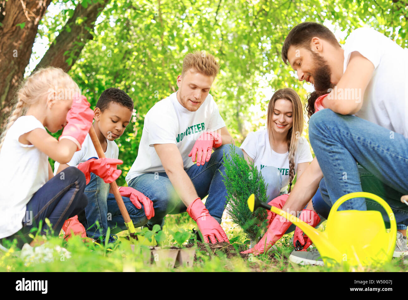 African boy planting tree hi-res stock photography and images - Alamy