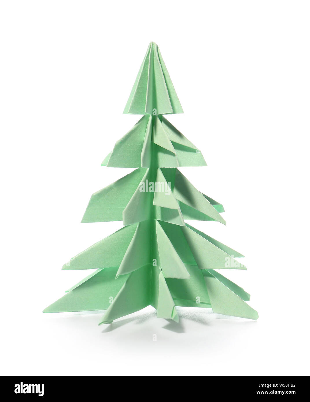 Paper Christmas tree on white background Stock Photo - Alamy