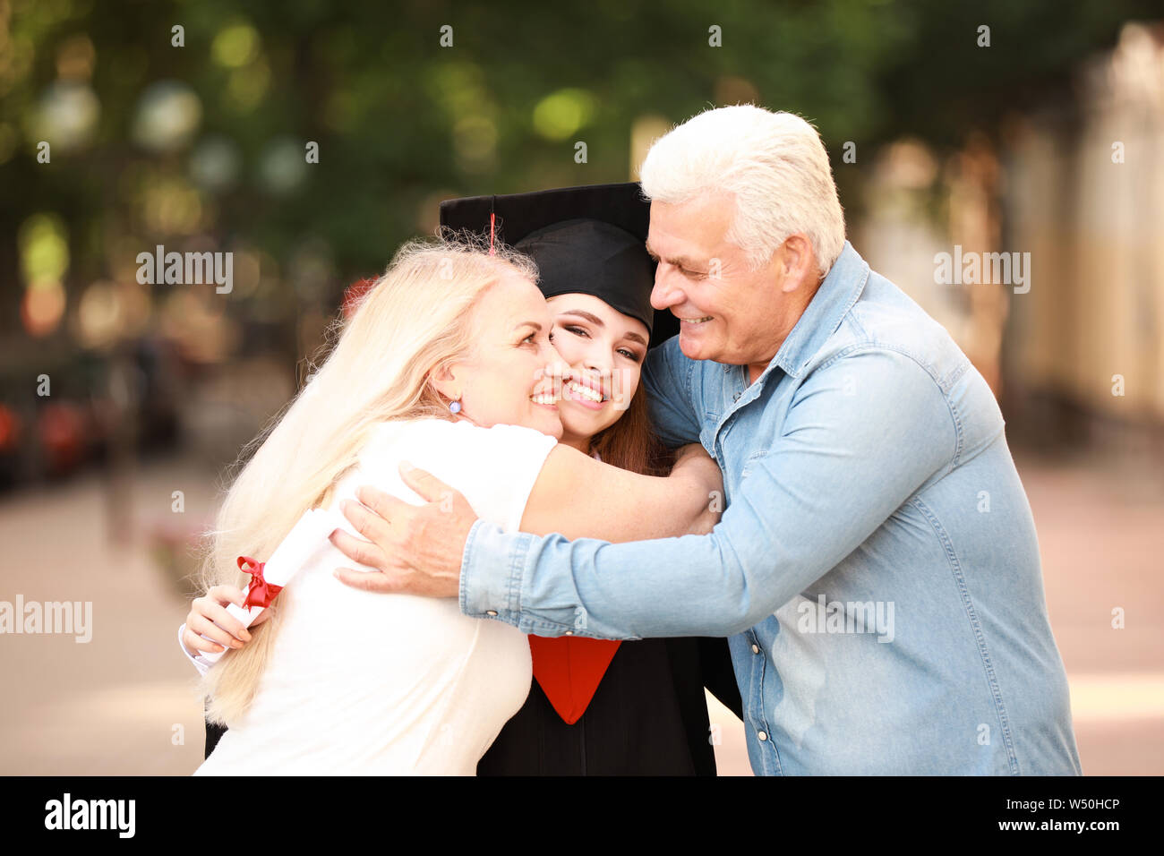 Parents daughter graduation hi-res stock photography and images - Alamy