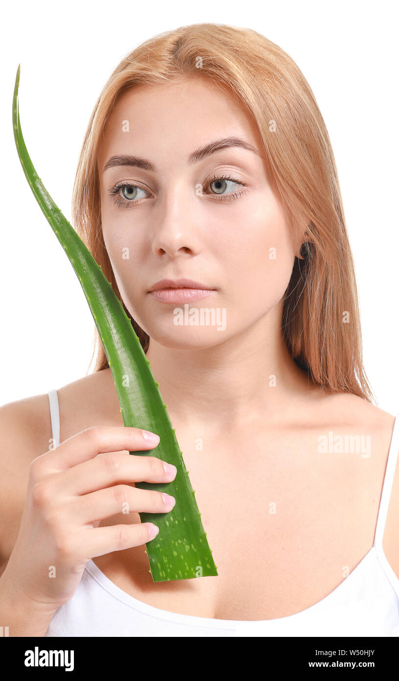 Beautiful young woman with aloe vera on white background Stock Photo ...