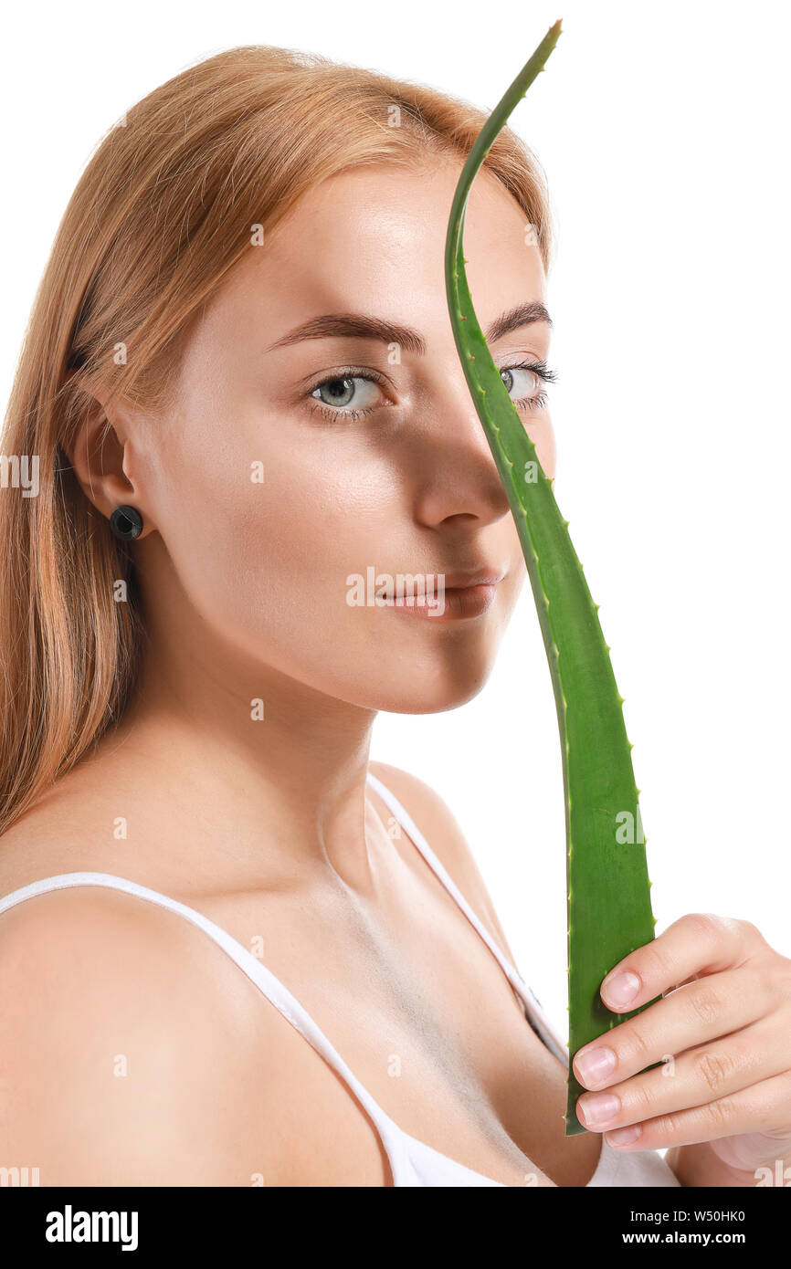 Beautiful young woman with aloe vera on white background Stock Photo ...
