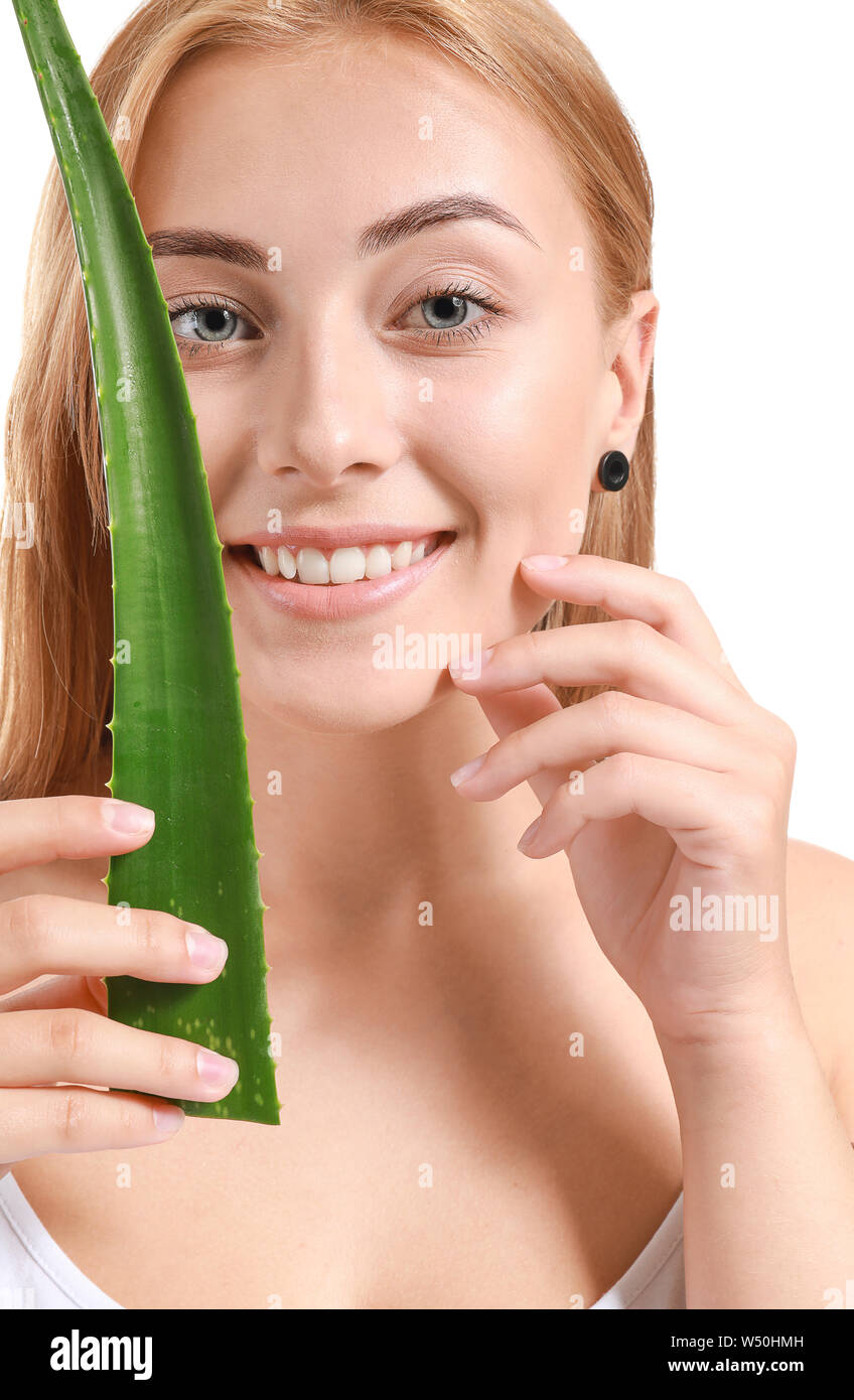 Beautiful young woman with aloe vera on white background Stock Photo ...
