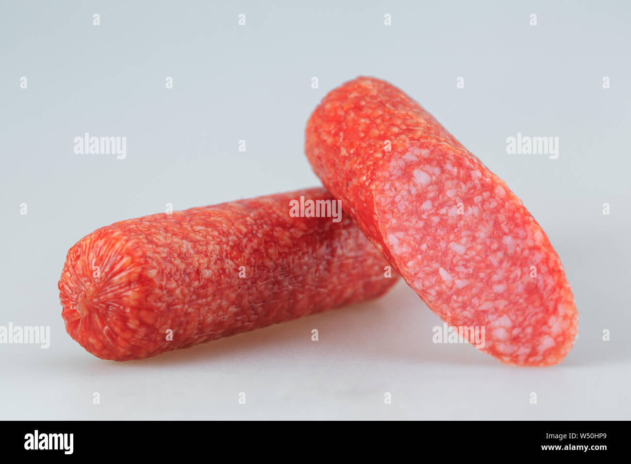 Fresh sausages isolated on a white background Stock Photo - Alamy