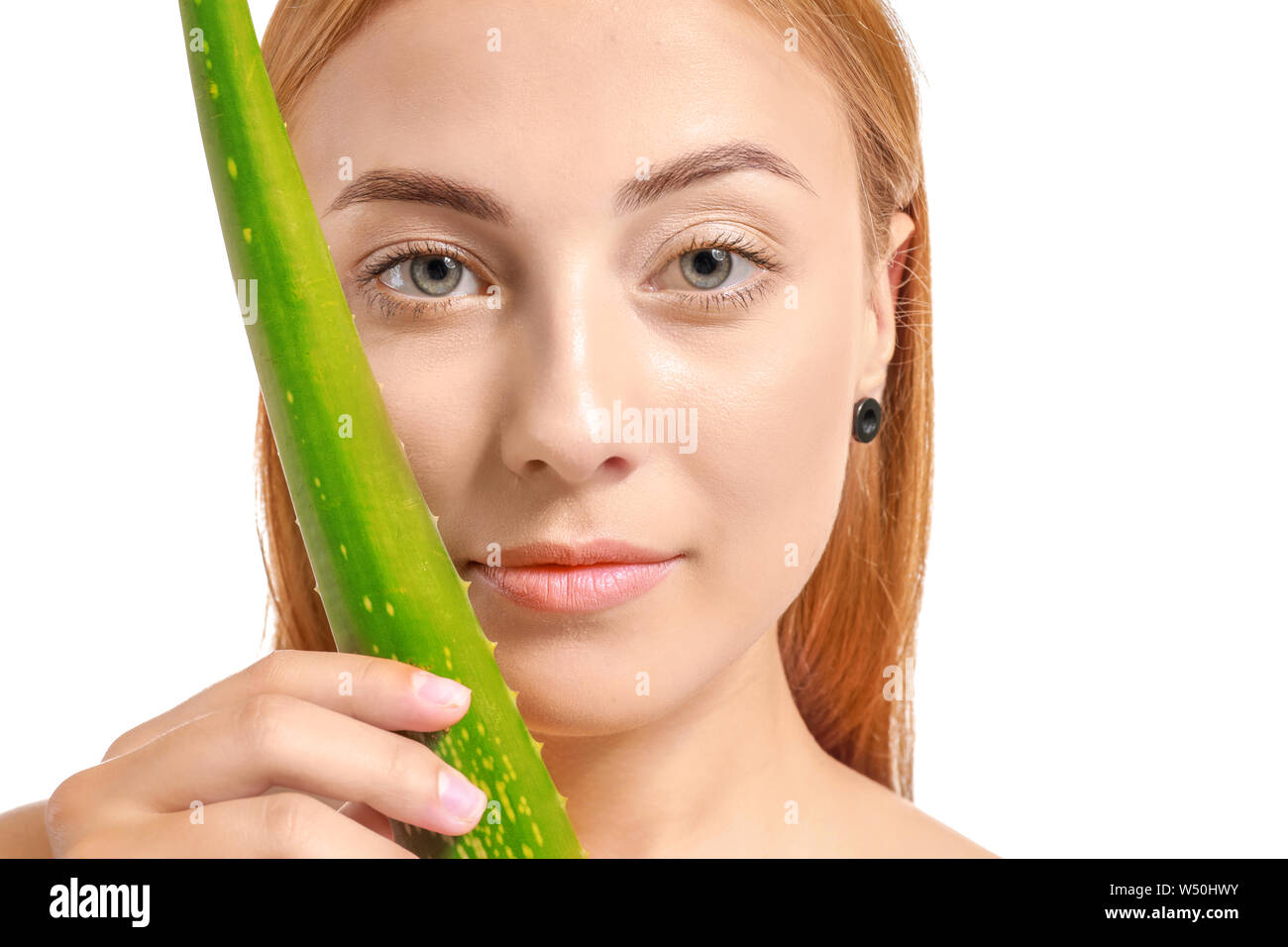 Beautiful young woman with aloe vera on white background Stock Photo ...
