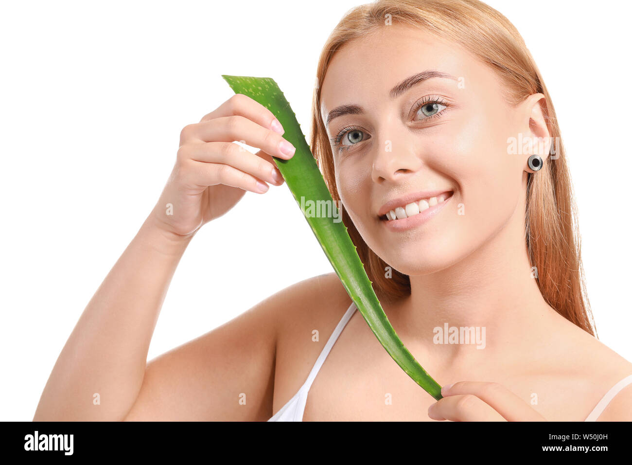 Beautiful young woman with aloe vera on white background Stock Photo ...