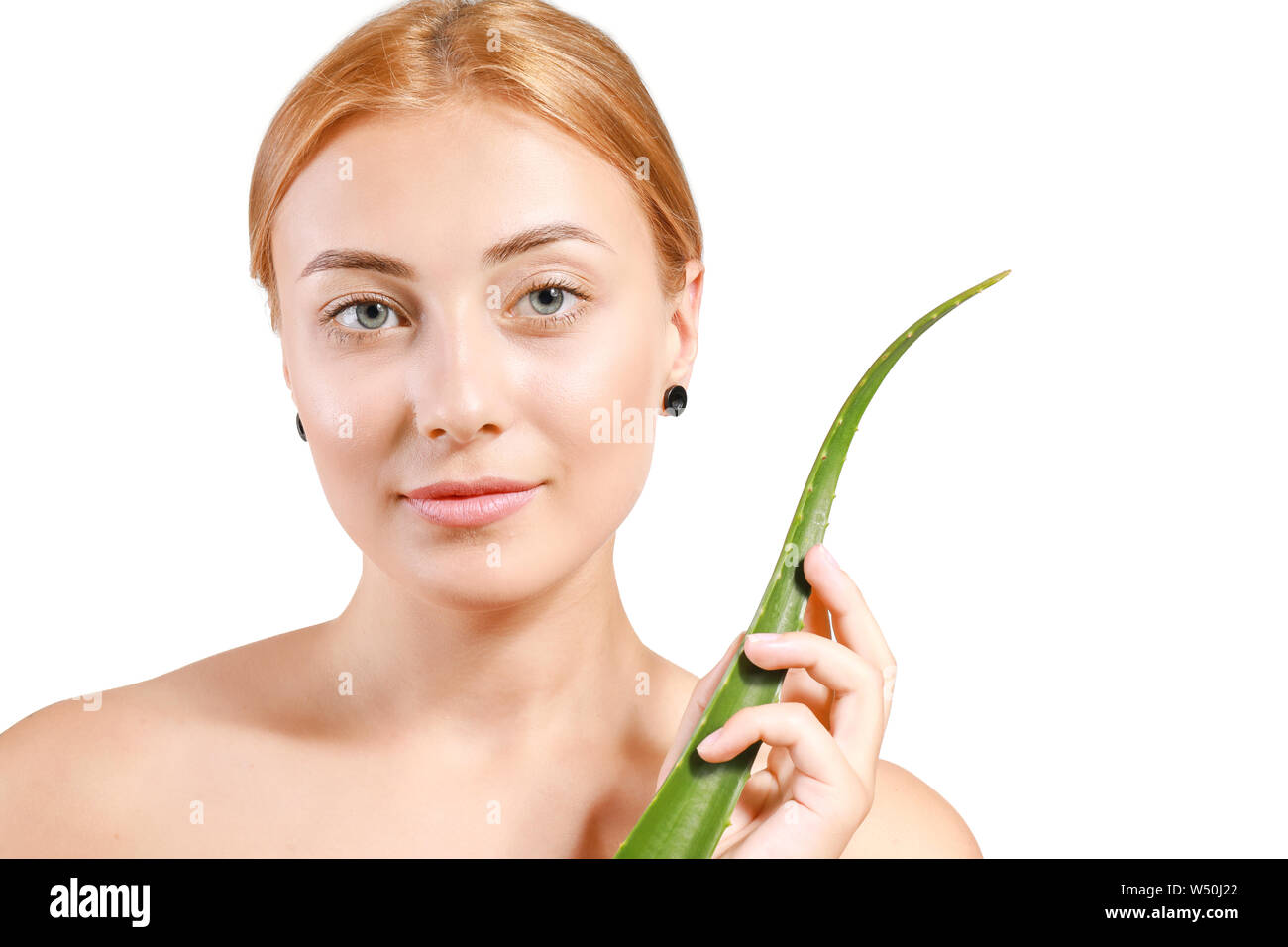 Beautiful young woman with aloe vera on white background Stock Photo ...