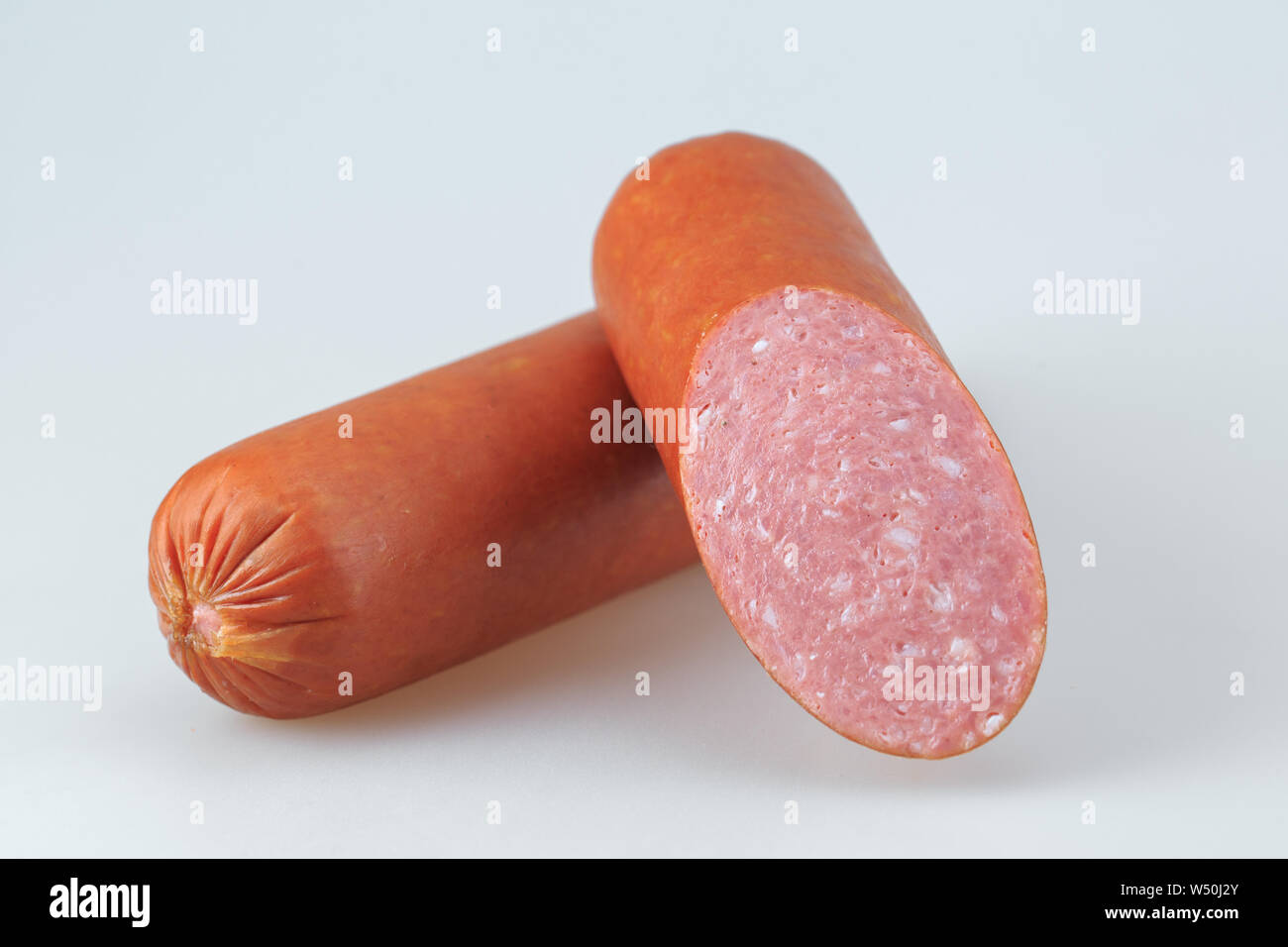 Fresh sausages isolated on a white background Stock Photo - Alamy