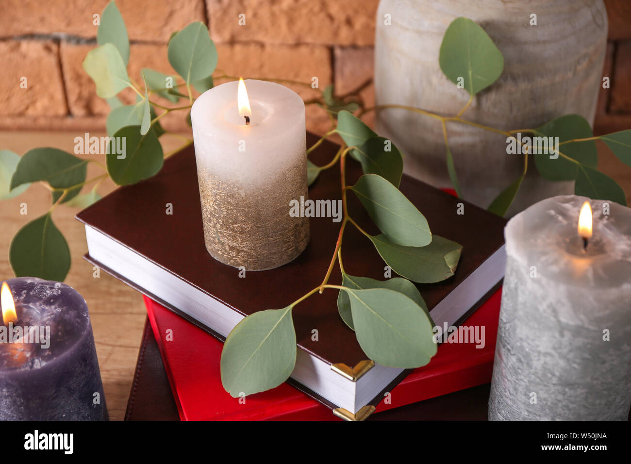 Beautiful burning candles eucalyptus hi-res stock photography and ...