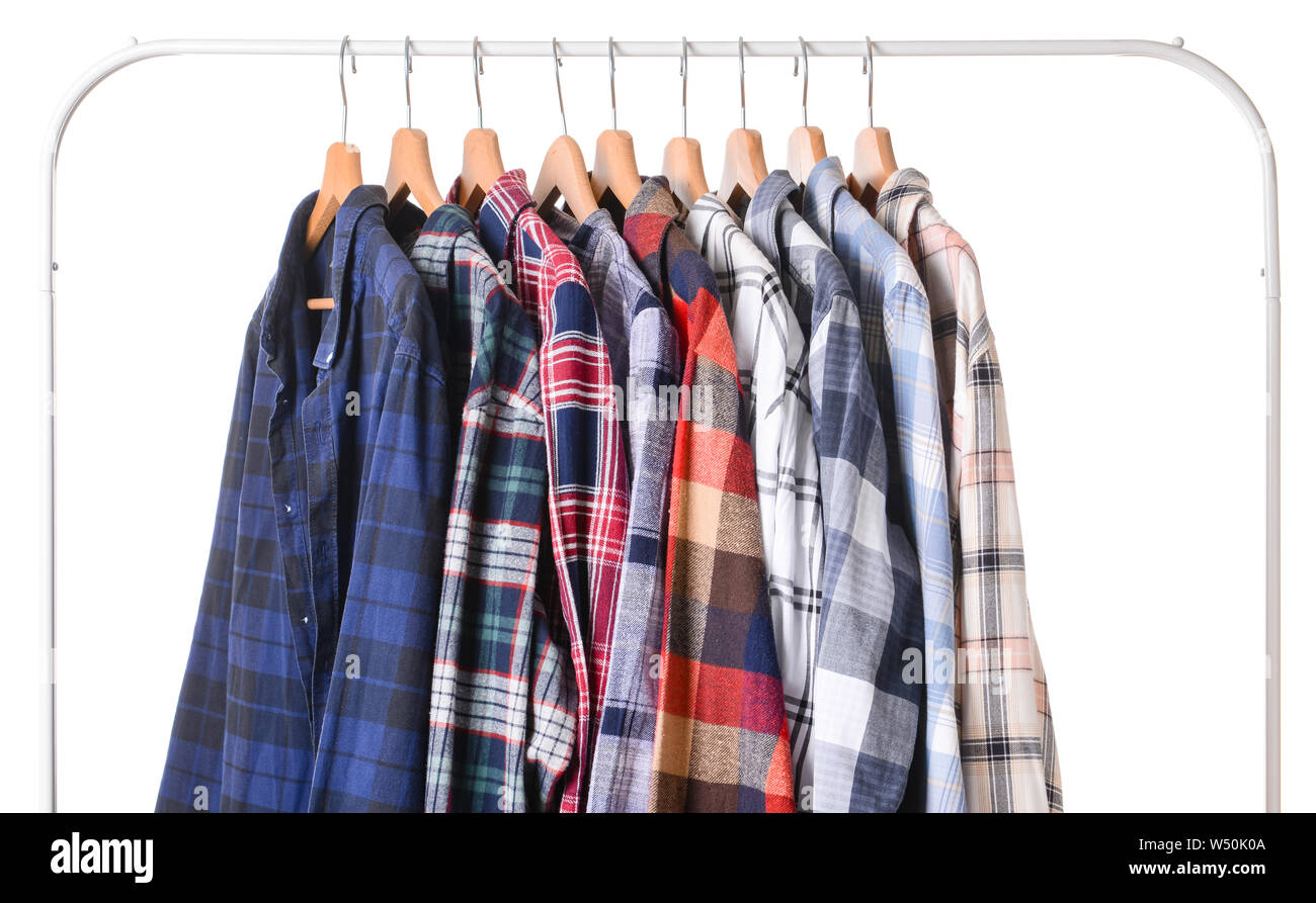 Rack with hanging clothes on white background Stock Photo - Alamy