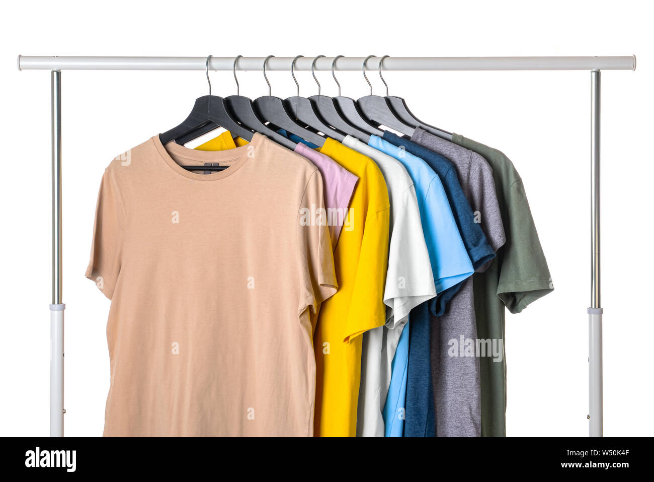Rack with hanging clothes on white background Stock Photo - Alamy