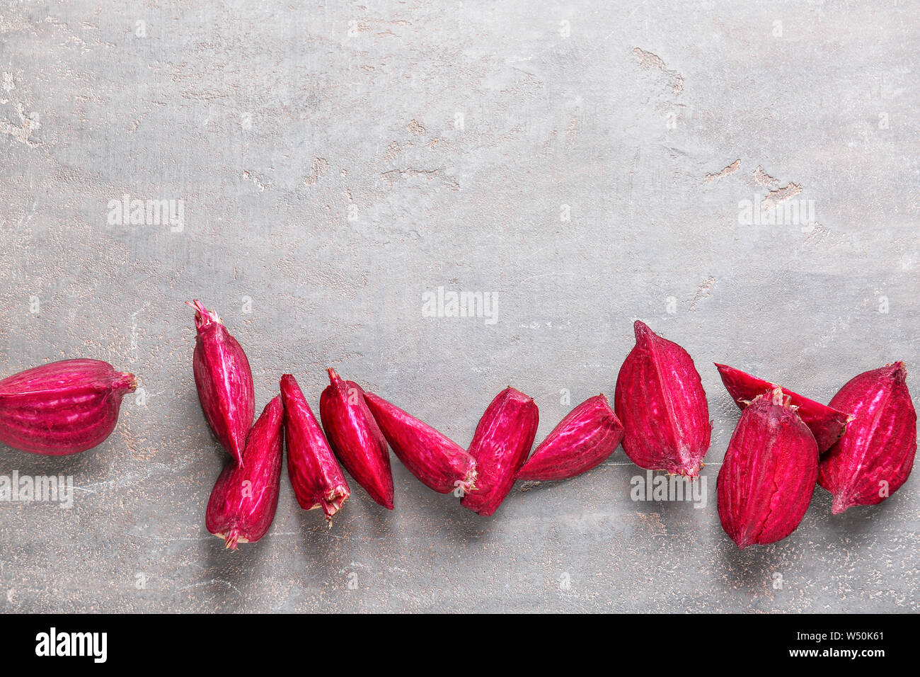 Fresh cut beet on grey background Stock Photo - Alamy