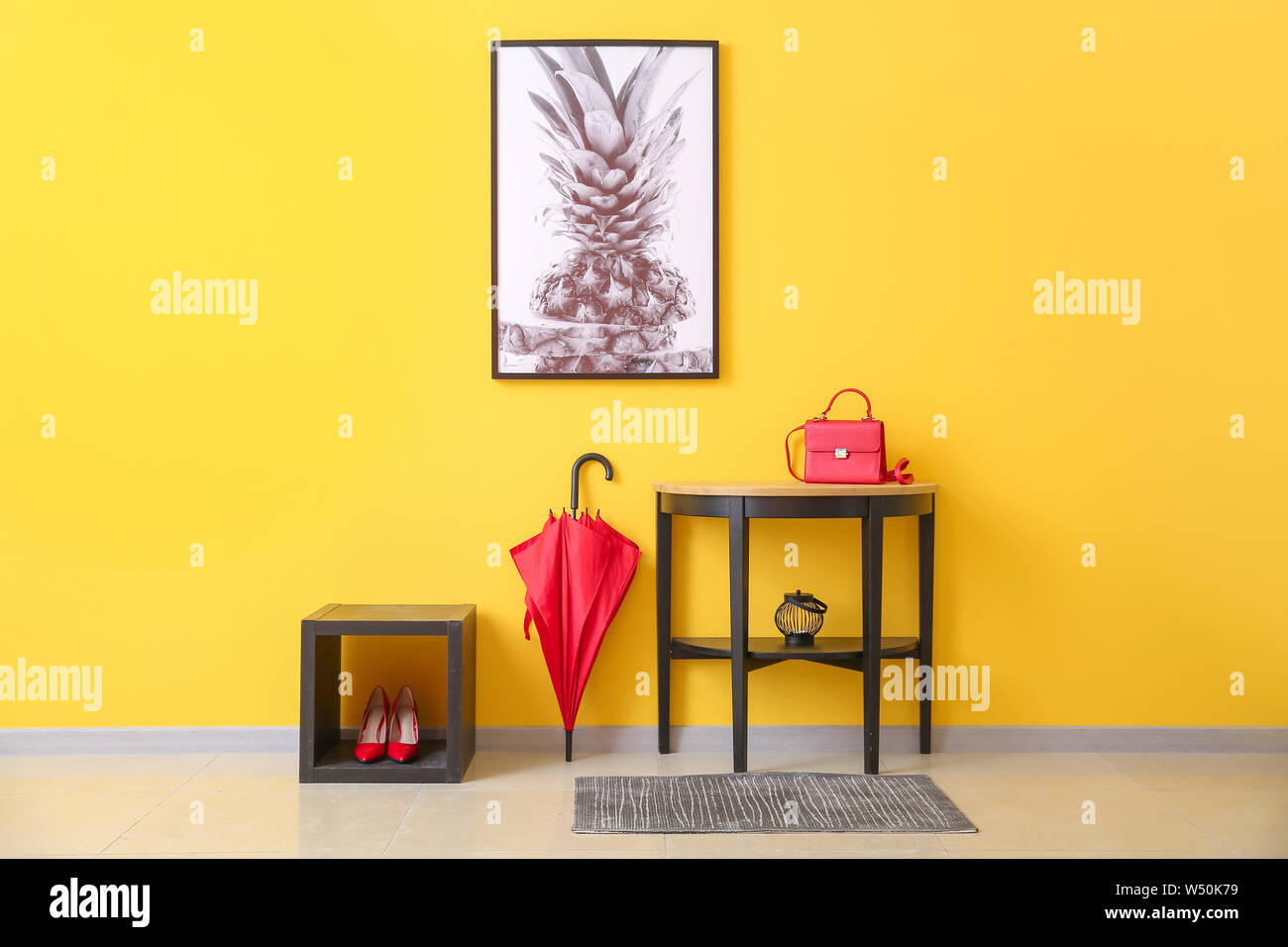 Stylish umbrella in interior of hall Stock Photo - Alamy