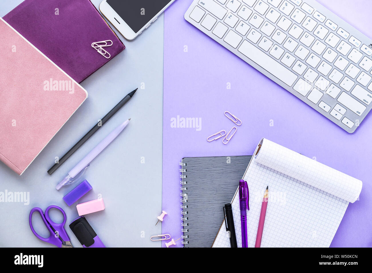 Composition with stationery and computer keyboard on color background ...