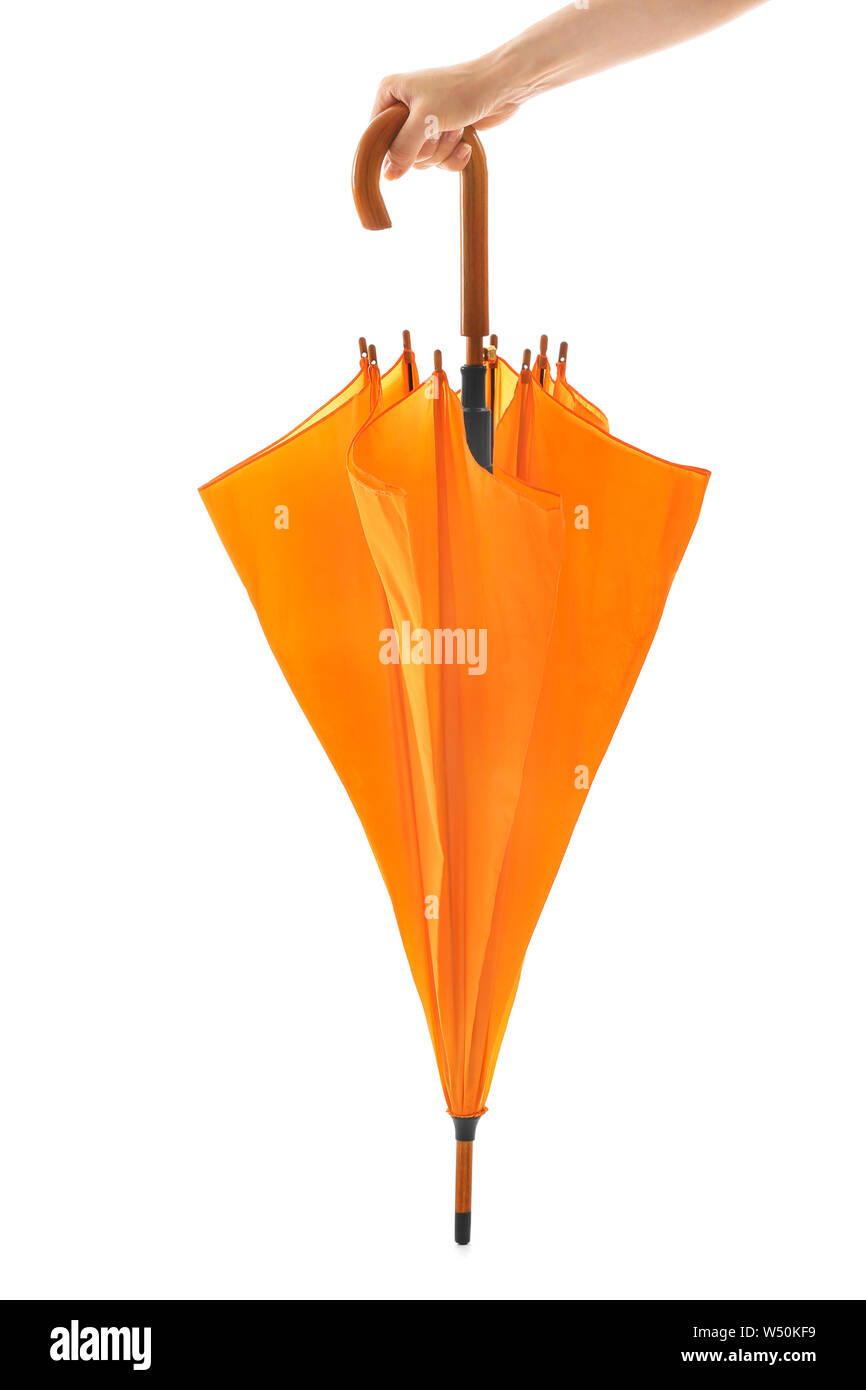 Female hand with stylish umbrella on white background Stock Photo - Alamy