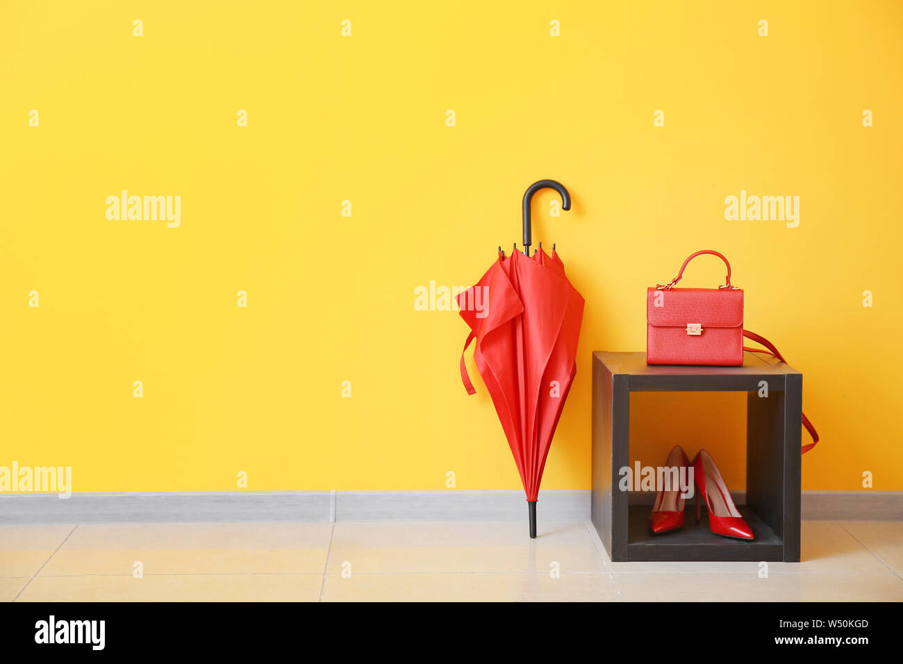 Stylish umbrella in interior of hall Stock Photo - Alamy