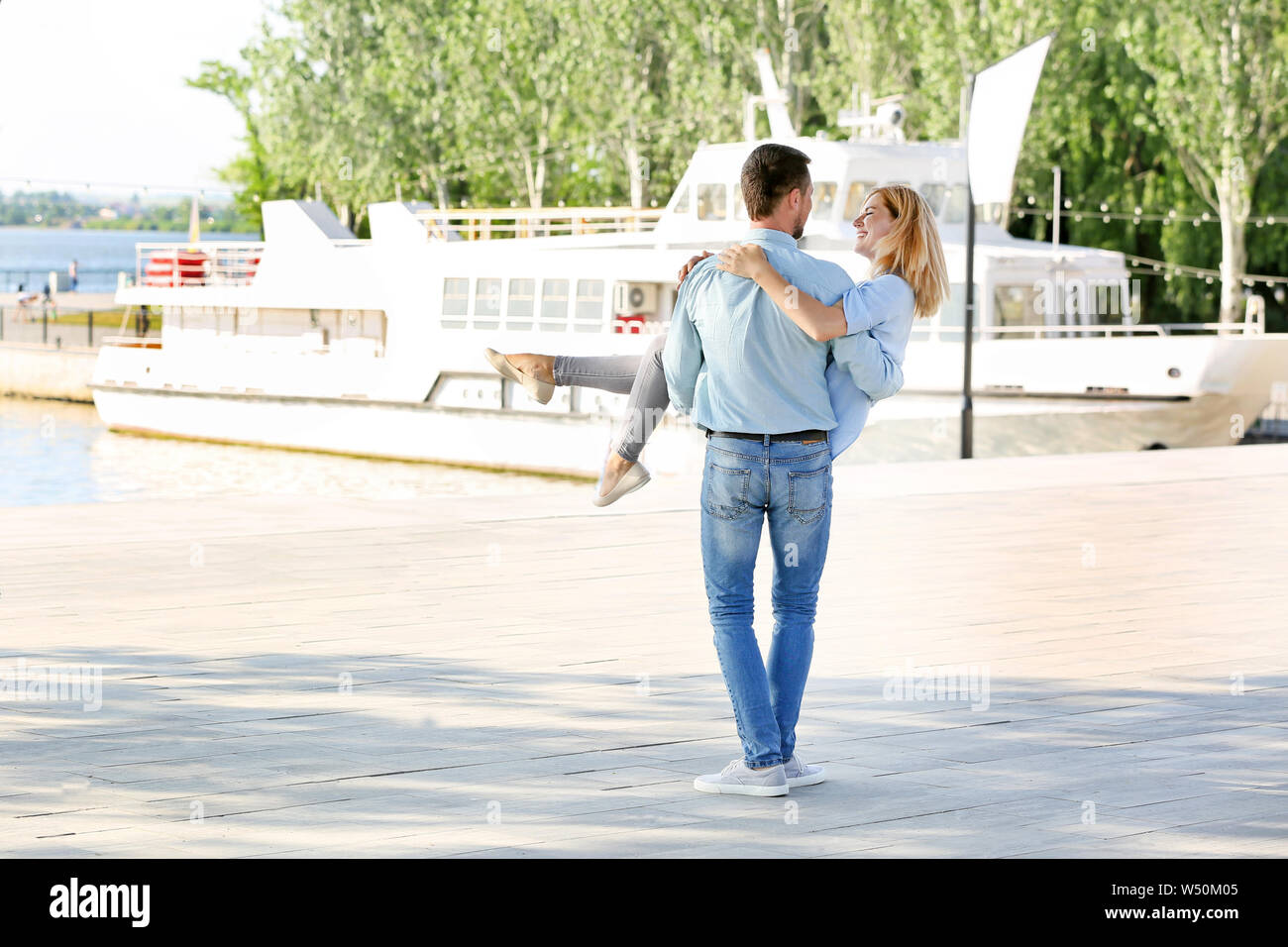 Happy couple in love having fun outdoors Stock Photo - Alamy