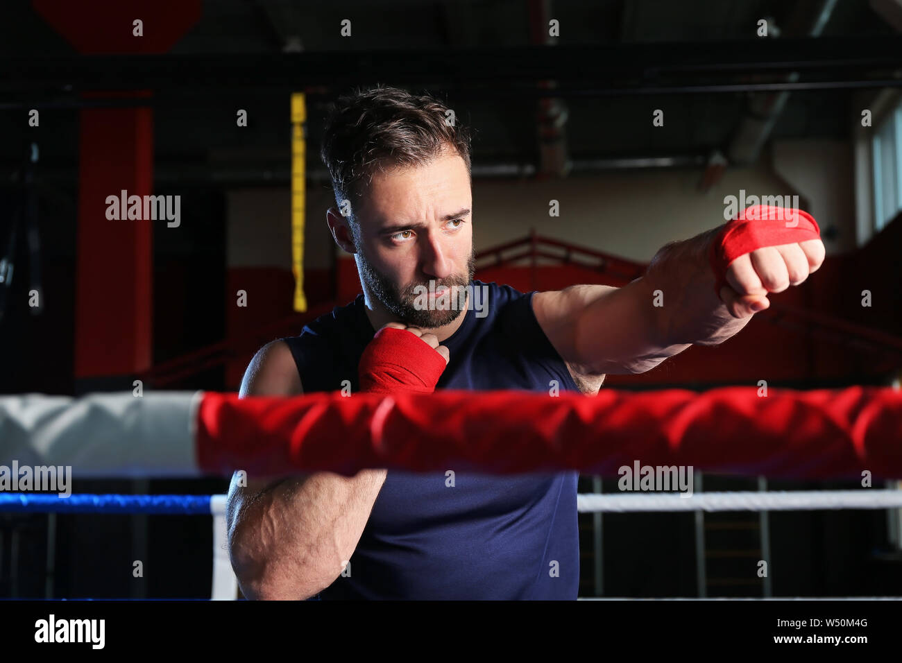 Sporty man in boxing ring Stock Photo - Alamy