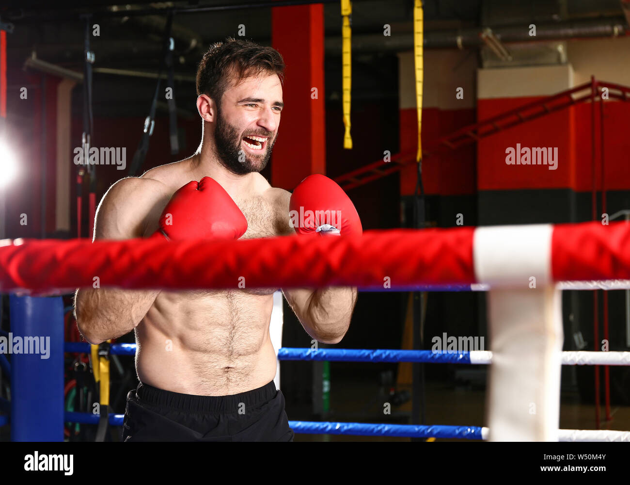 Sporty man in boxing ring Stock Photo - Alamy