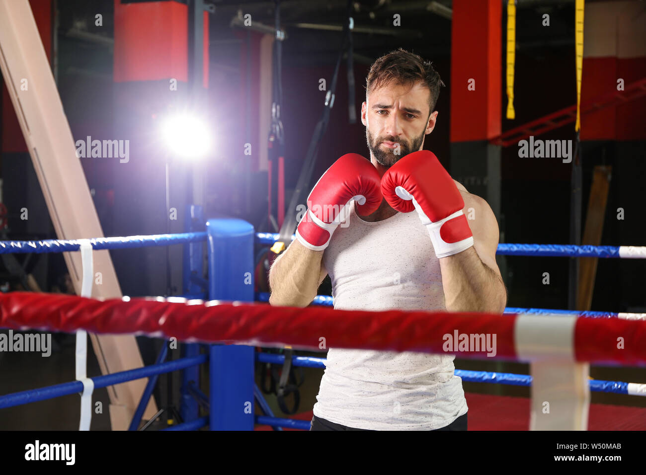 Sporty man in boxing ring Stock Photo - Alamy