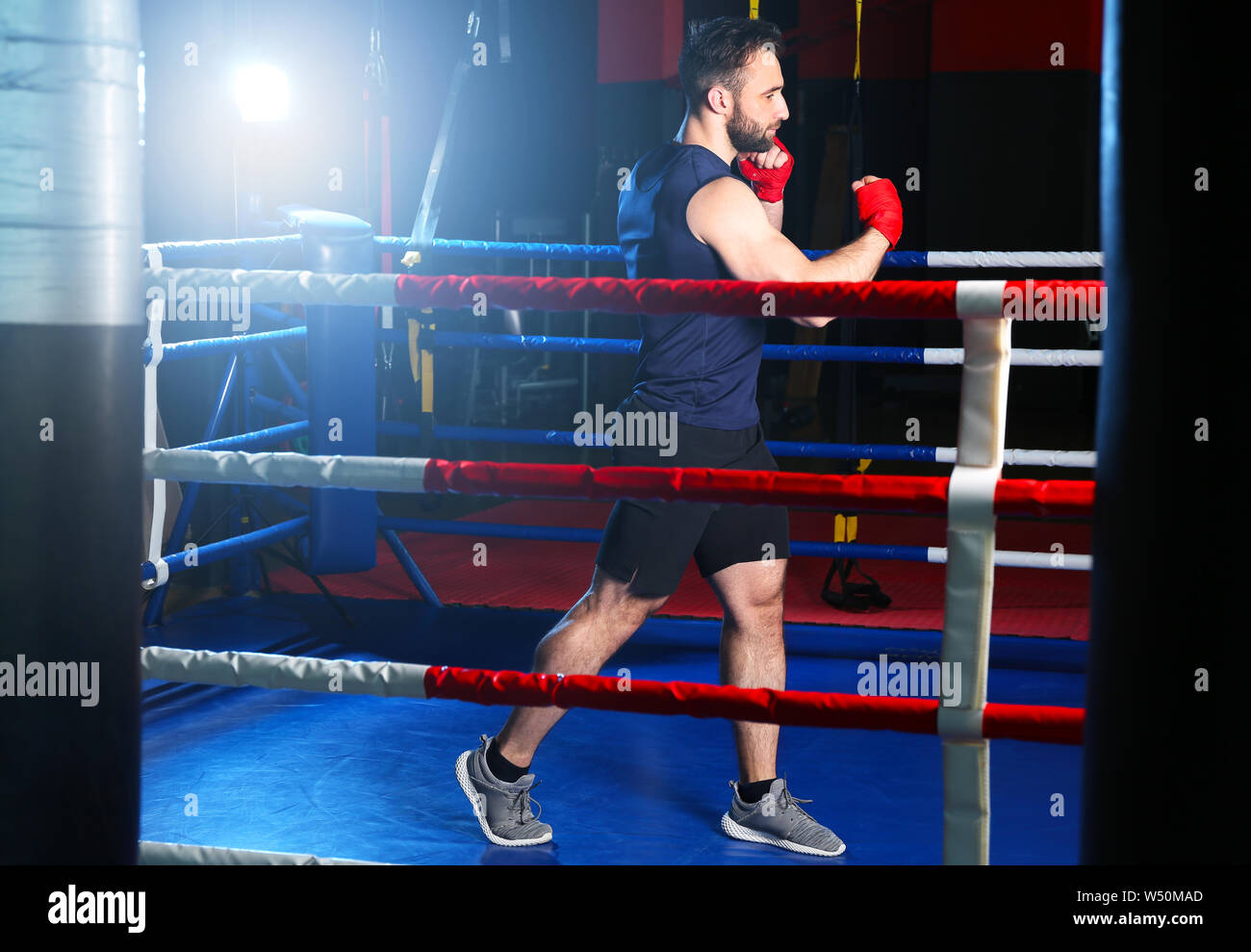 Sporty man in boxing ring Stock Photo - Alamy
