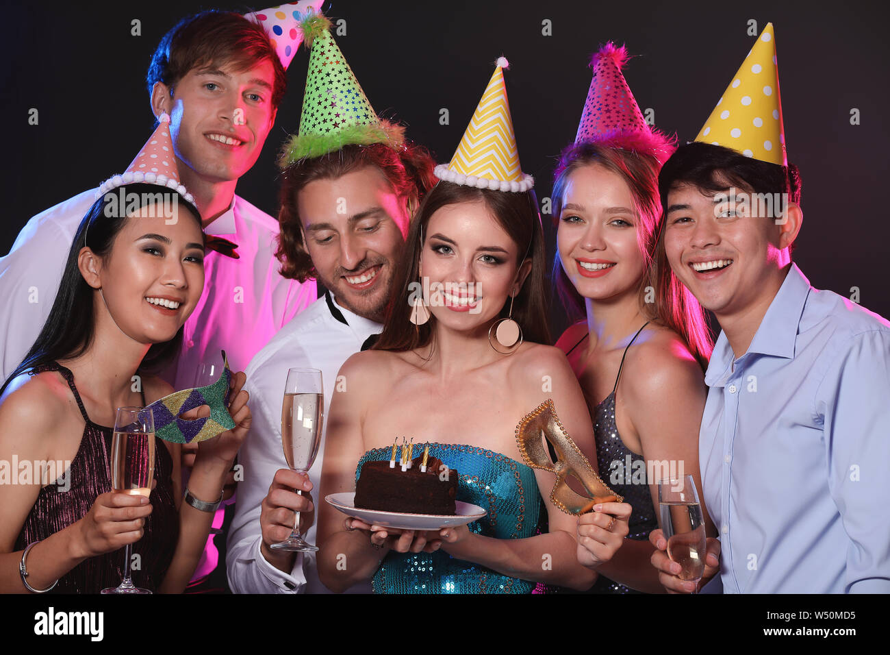 Group of friends celebrating Birthday in night club Stock Photo - Alamy