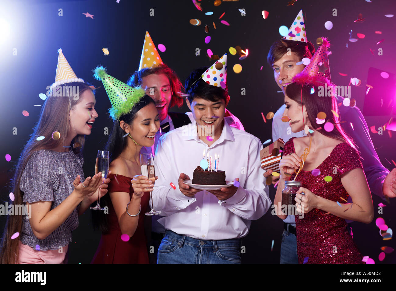 Group of friends celebrating Birthday in night club Stock Photo - Alamy