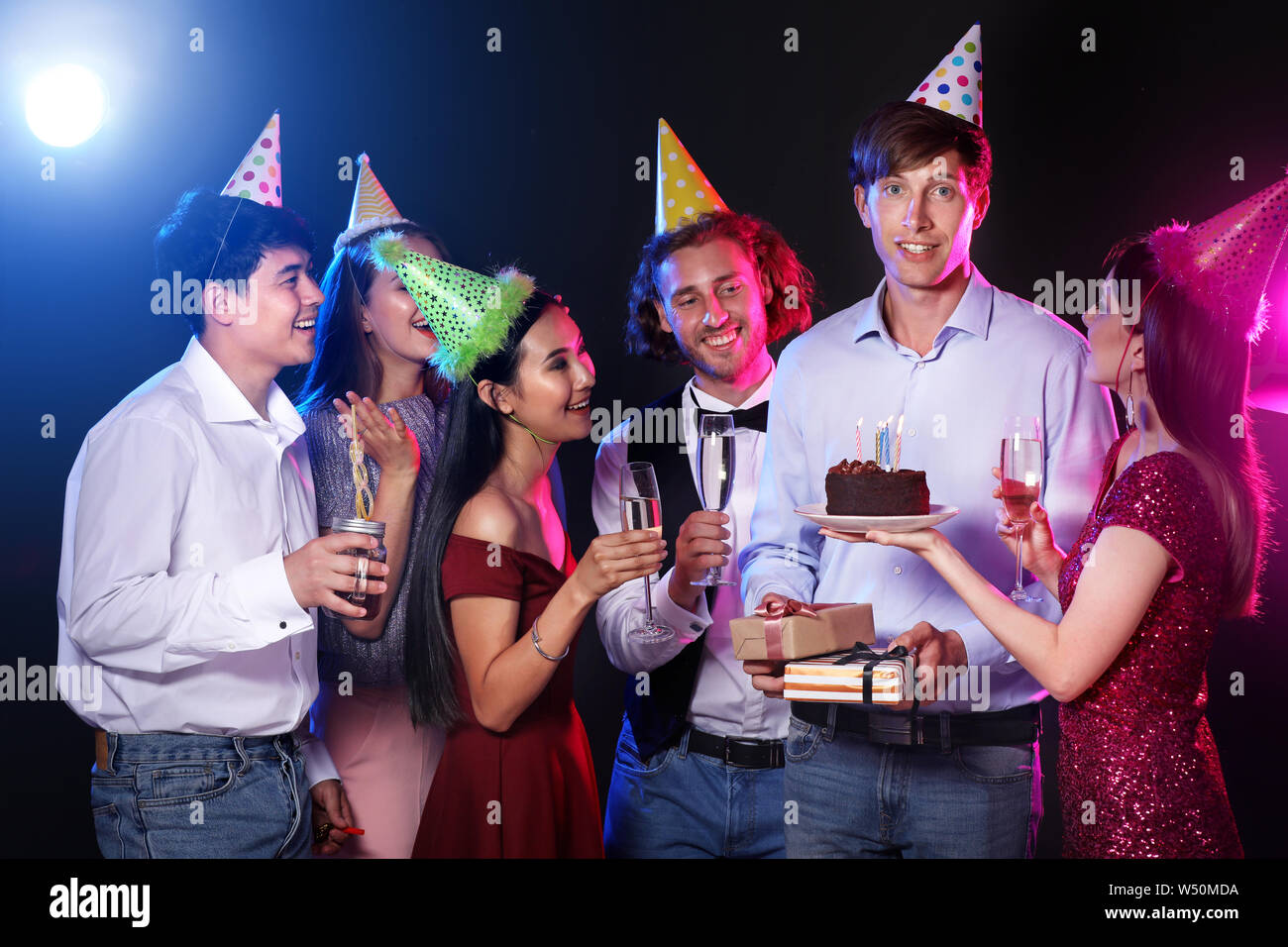Group of friends celebrating Birthday in night club Stock Photo - Alamy