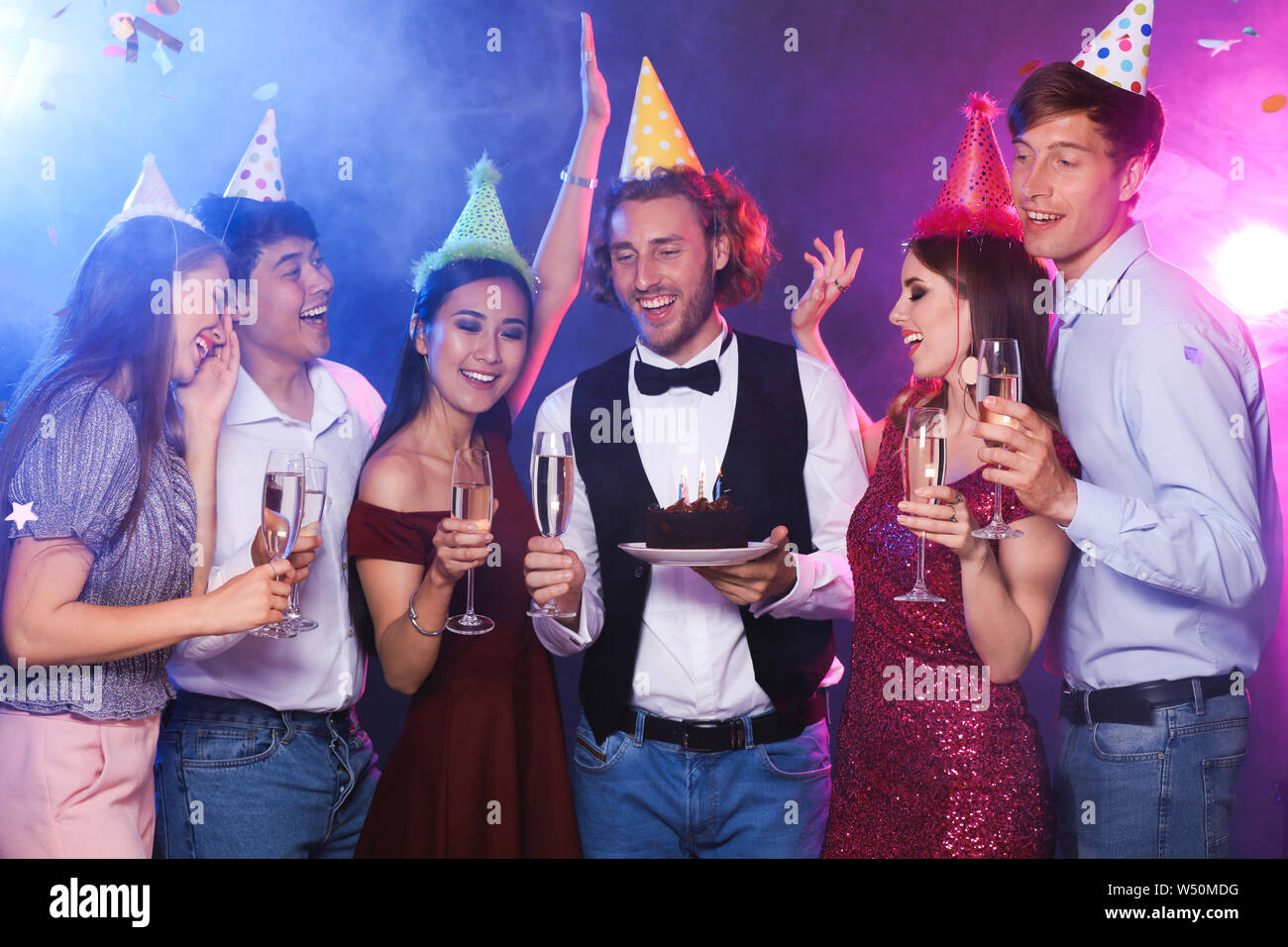 Group of friends celebrating Birthday in night club Stock Photo - Alamy