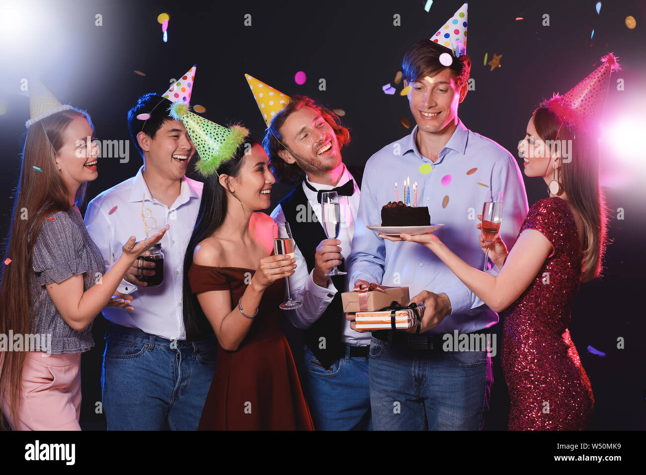 Group of friends celebrating Birthday in night club Stock Photo - Alamy